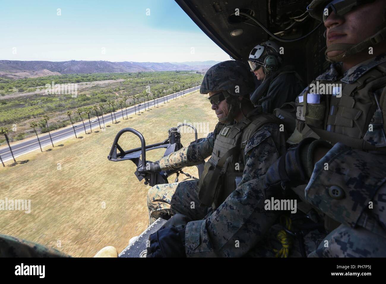 Marines with Marine Light Attack Helicopter Squadron (HMLA) 369 insert ...