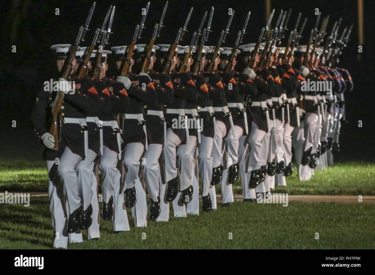Marines with U.S. Marine Corps Silent Drill Platoon march on the parade ...