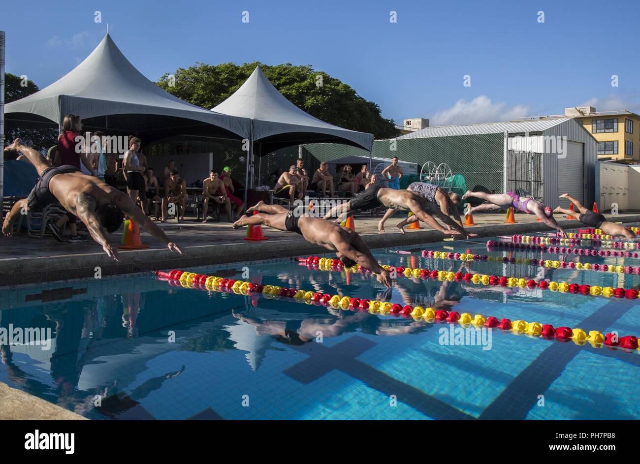 U.S. Service members with Marine Corps Base Hawaii (MCBH) dive into the ...
