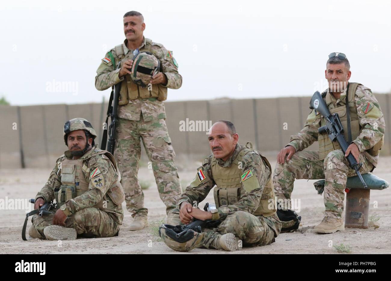 A group of Anbar Operations Center Commandos standby during a training ...
