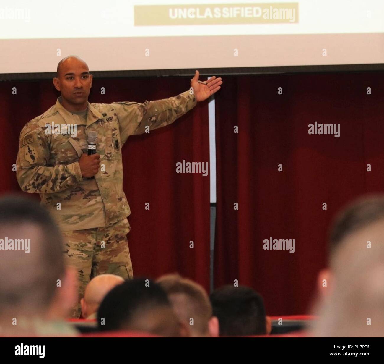 U.S. Army Lt. Col. Eddie Diaz, Deputy ARCENT G-6, addresses the ...