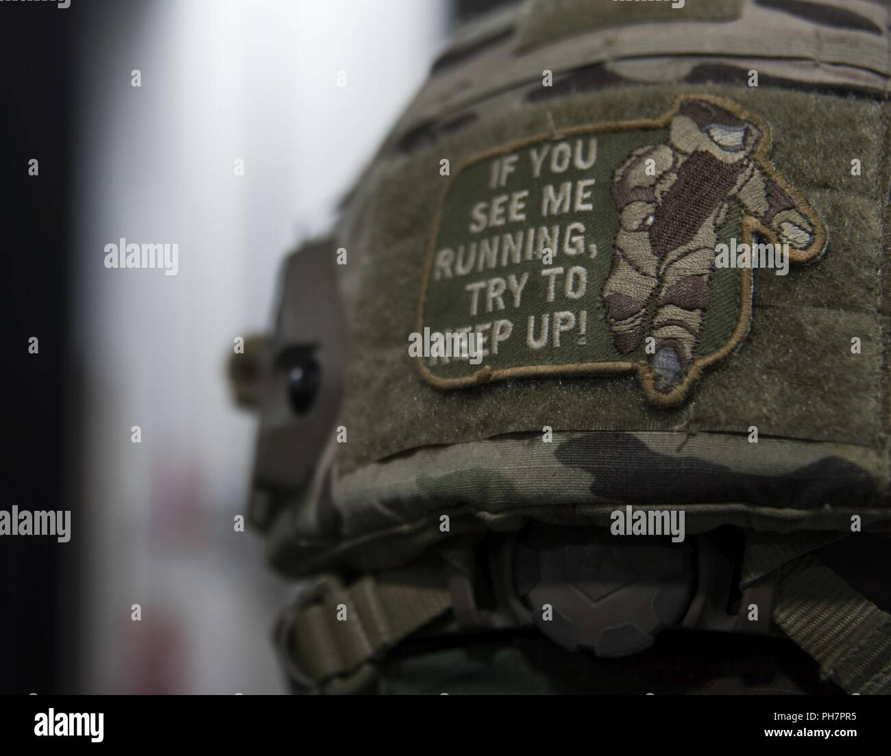 A patch is displayed on a helmet during a 11th Civil Engineer Squadron ...