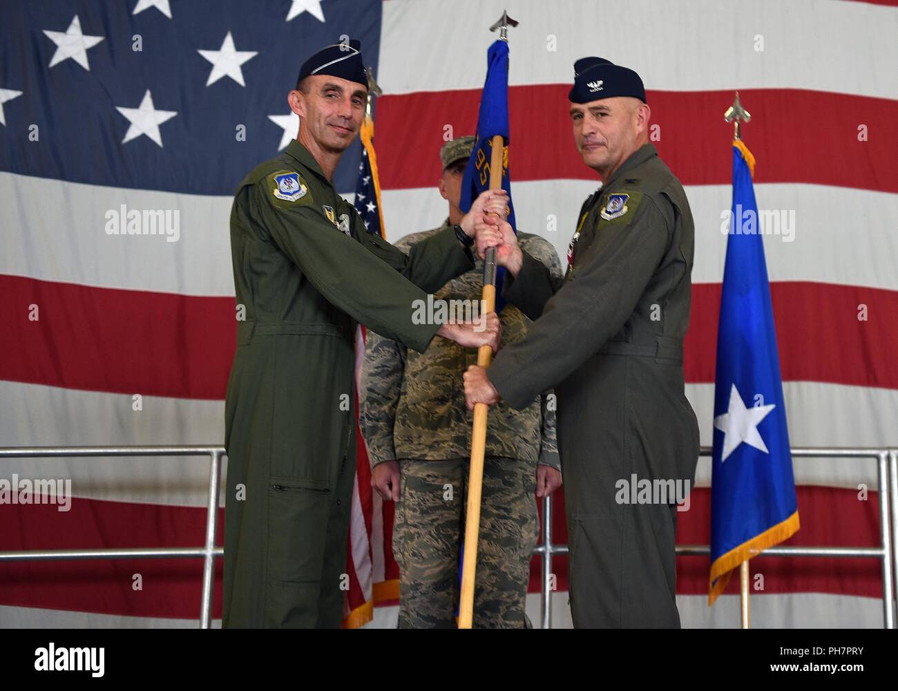 U.S. Air Force Col. Michael J. Dean, right, 495th Fighter Group (FG) outgoing commander ...