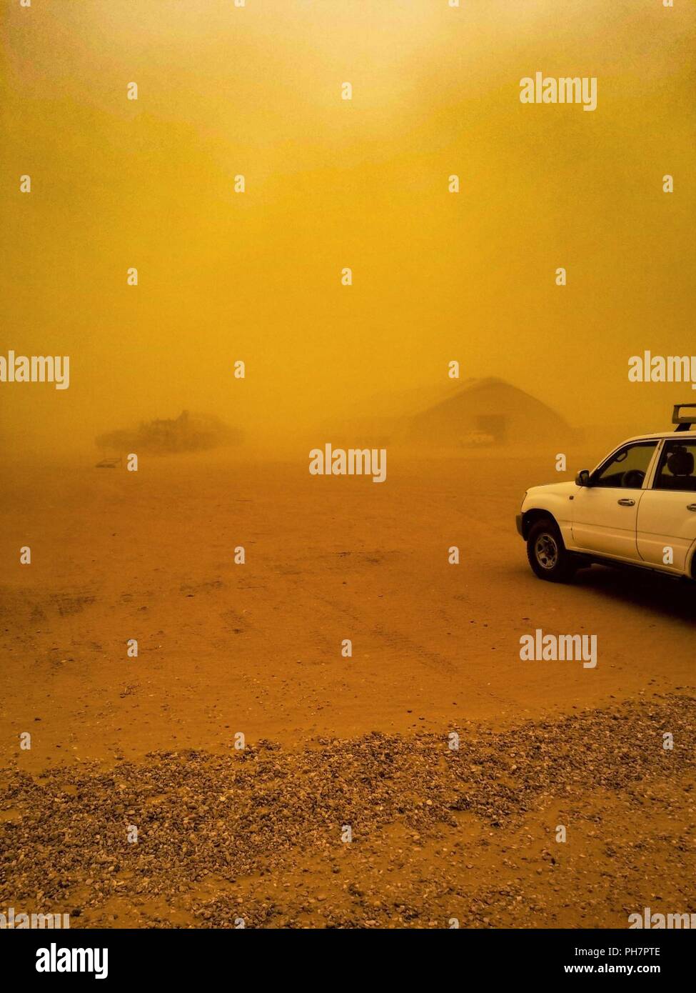 Visibility lowers as a sand storm passes through the region at Nigerien ...