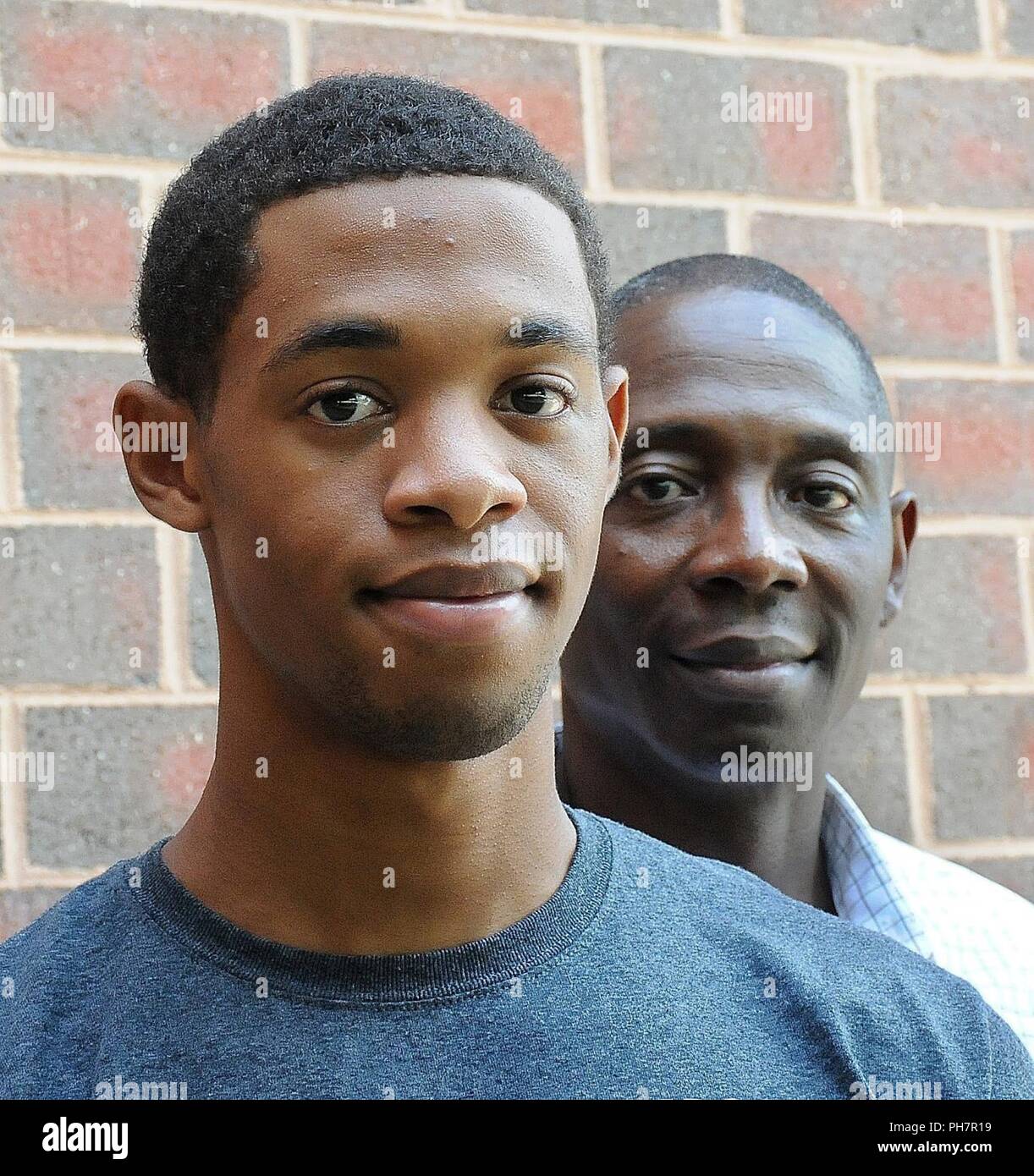 Col. George and Jacob Milton pose for pictures June 27. Jacob, a 20 ...