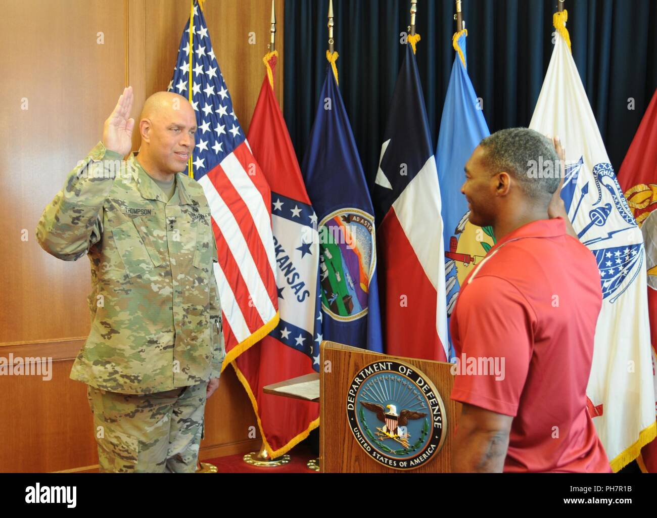 Maj. Gen. Michael Thompson, adjutant general for Oklahoma, administers ...