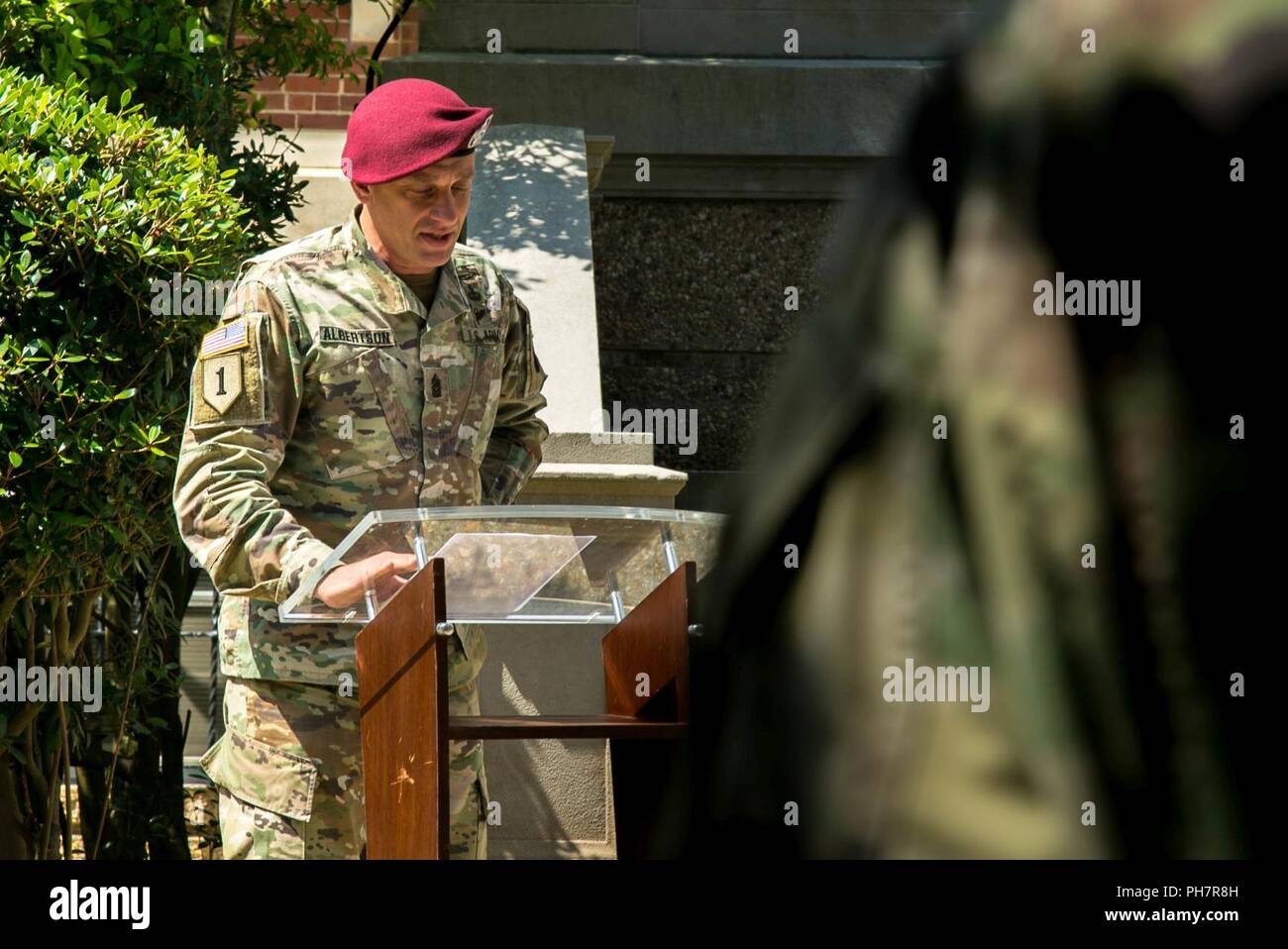 U. S. Army Command Sgt. Maj. Charles W. Albertson talks to the audience ...