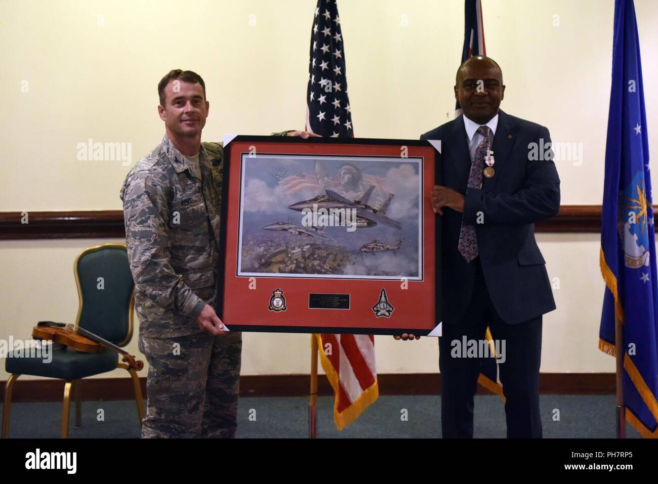 Col. John Kent, 48th Fighter Wing vice commander, presents a farewell ...