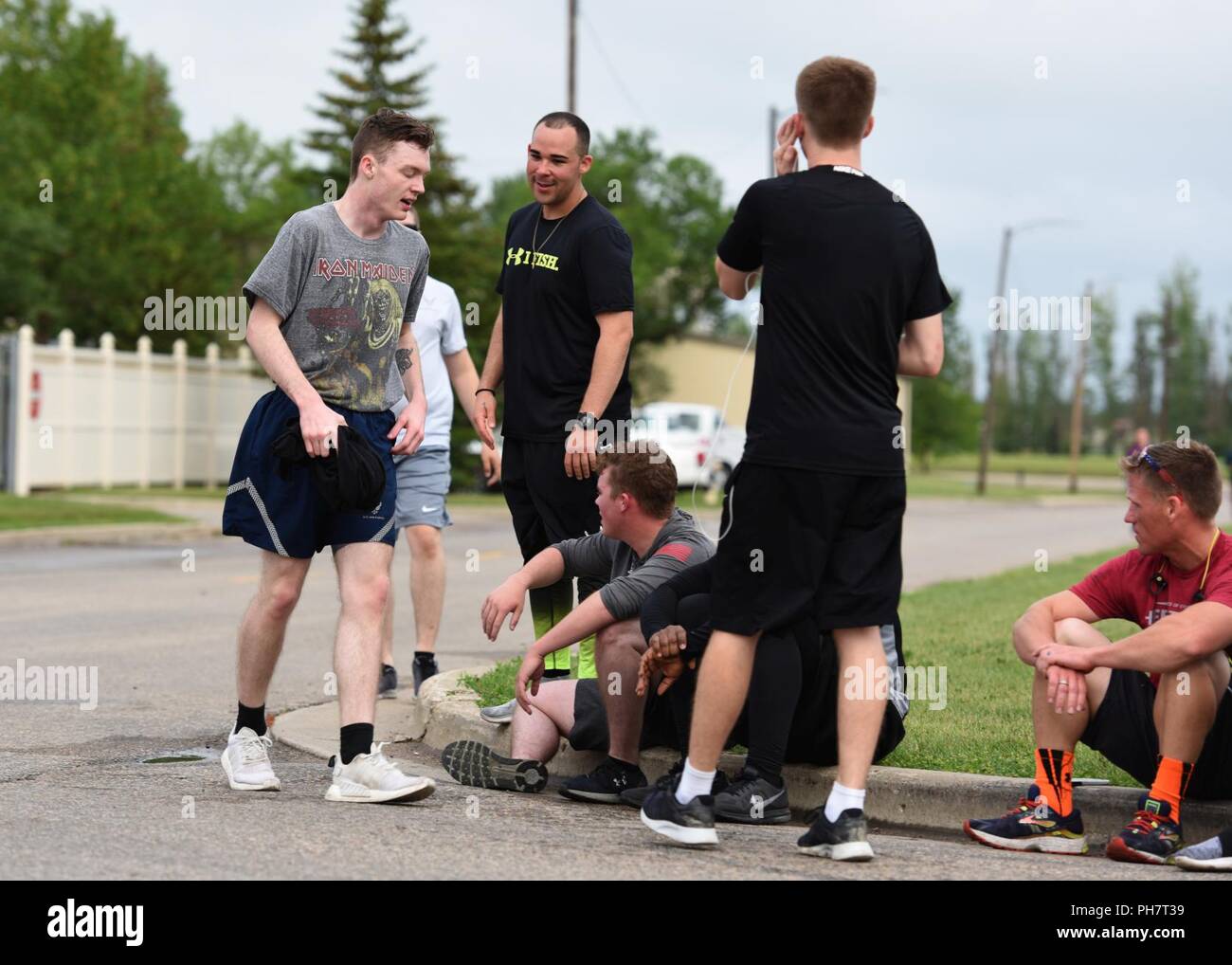 Team Minot Airmen rest after a 3-km run during the fourth annual Summer ...