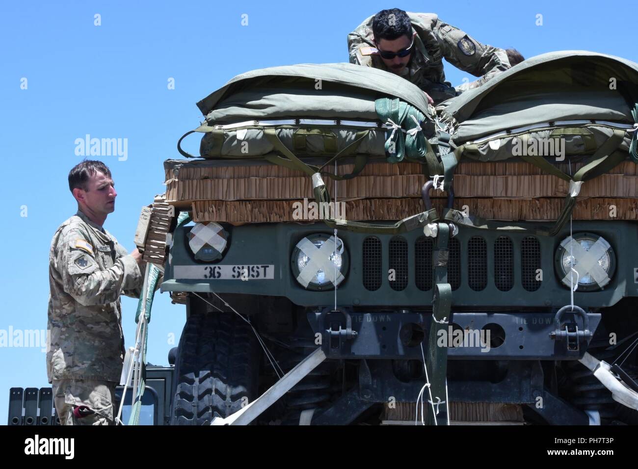 Texas Army National Guardsmen Specialist Travis Millhouse, 294th ...