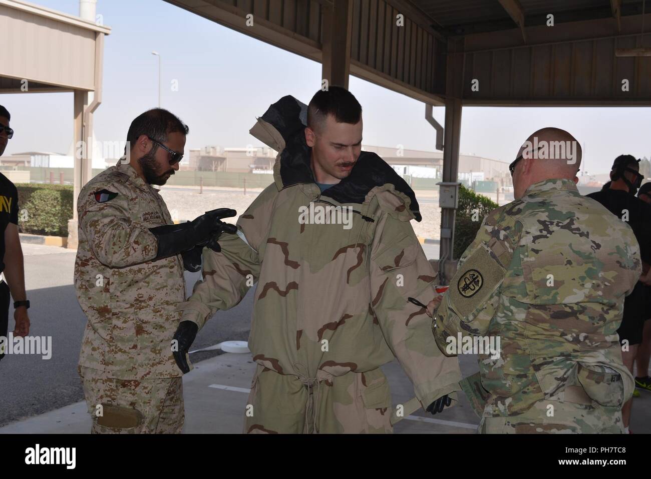 CAMP ARIFJAN, Kuwait – Capt. Abdul-Aziz Hamad Al-Muteri (left), with ...