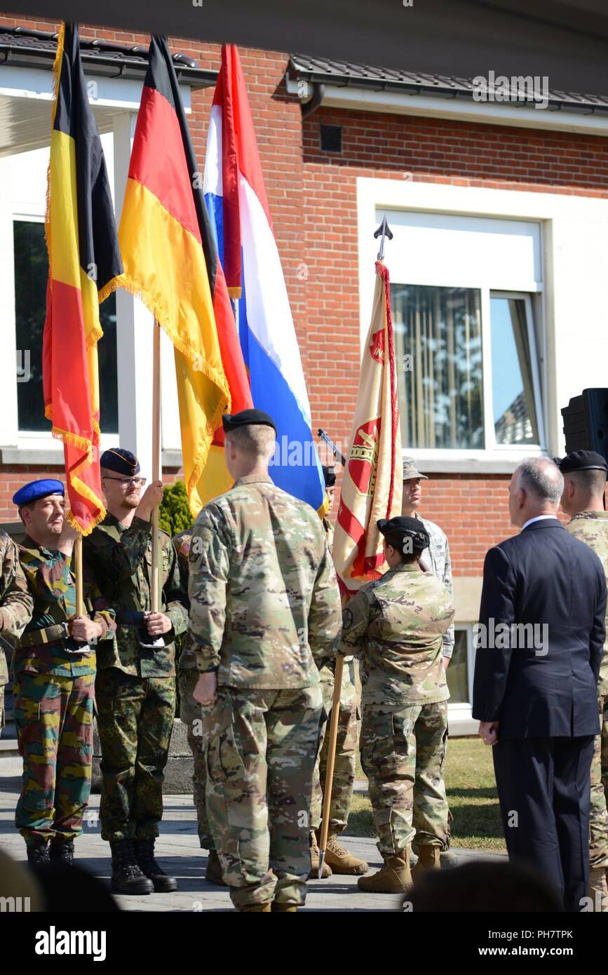 U.S. Army Command Sgt. Maj. Samara L. Pitre, receives the colors from ...