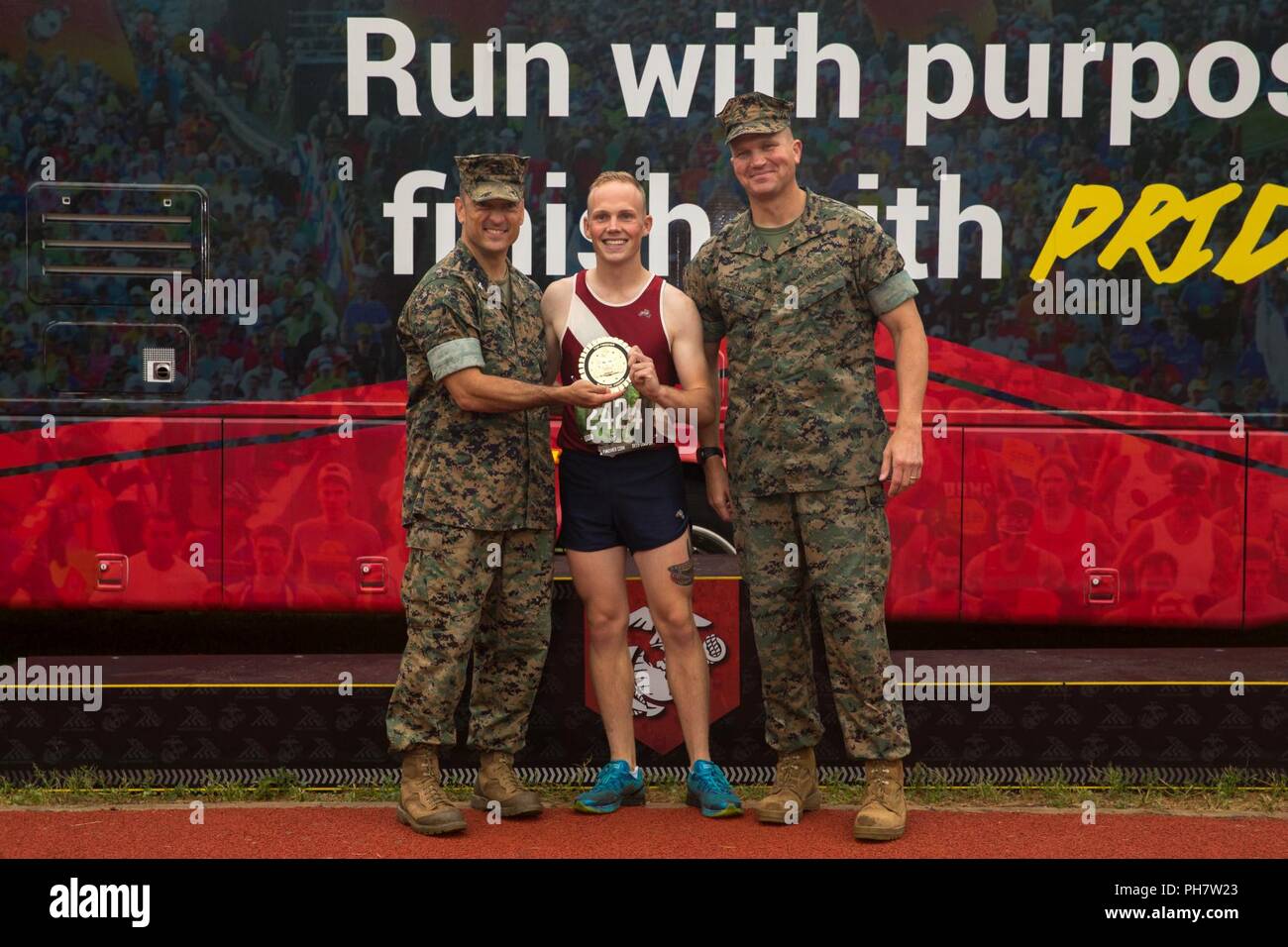 Bryce Peterson of Quantico, Va., is presented with the third place male ...