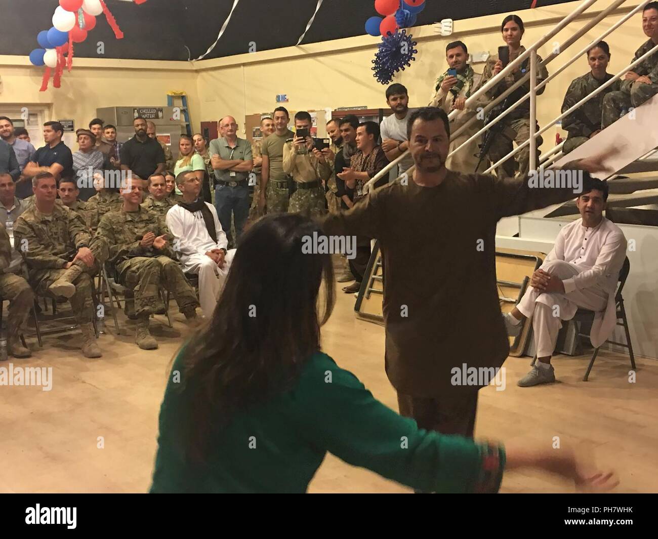 Mohammad Yahya Faqiri, right, a linguist for Train, Advise and Assist Command-South, comprised ...