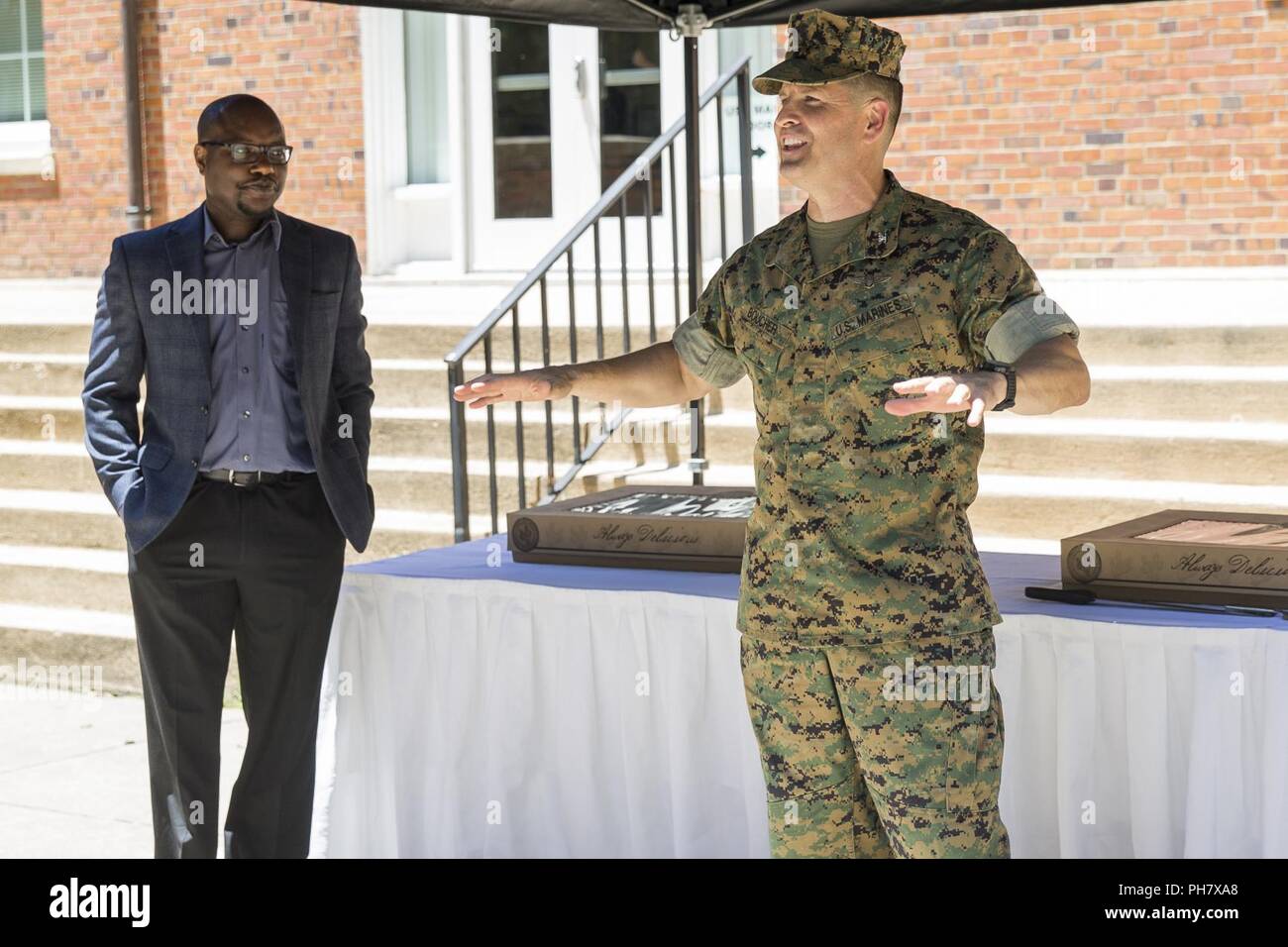 U.S. Marine Corps Col. Robert Boucher, right, chief of staff, Marine ...