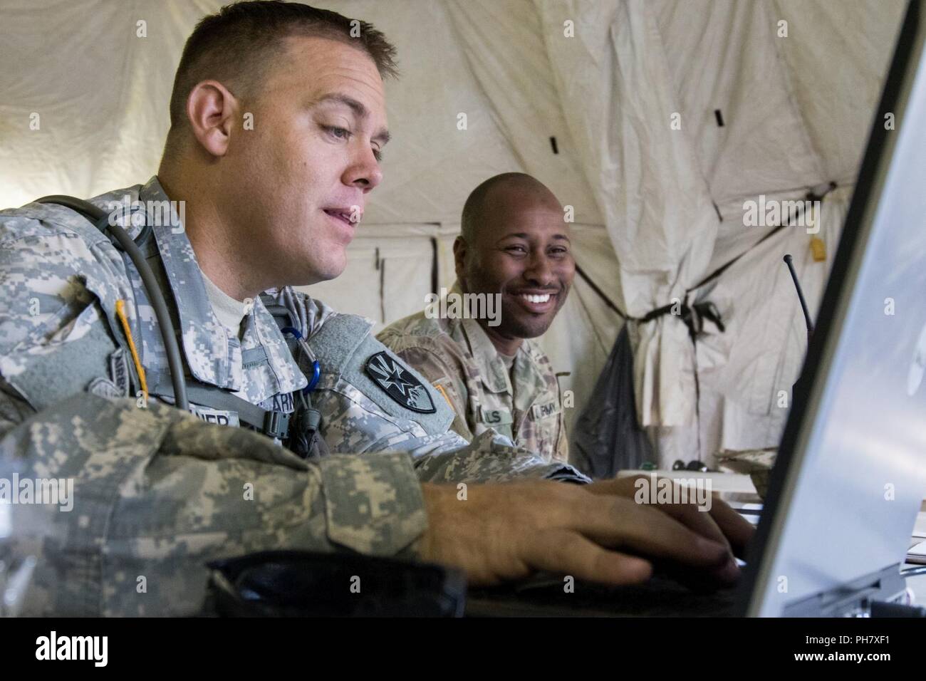 Arizona Army National Guard Sgt 1st Class Darin Hughner And Spc Kevin