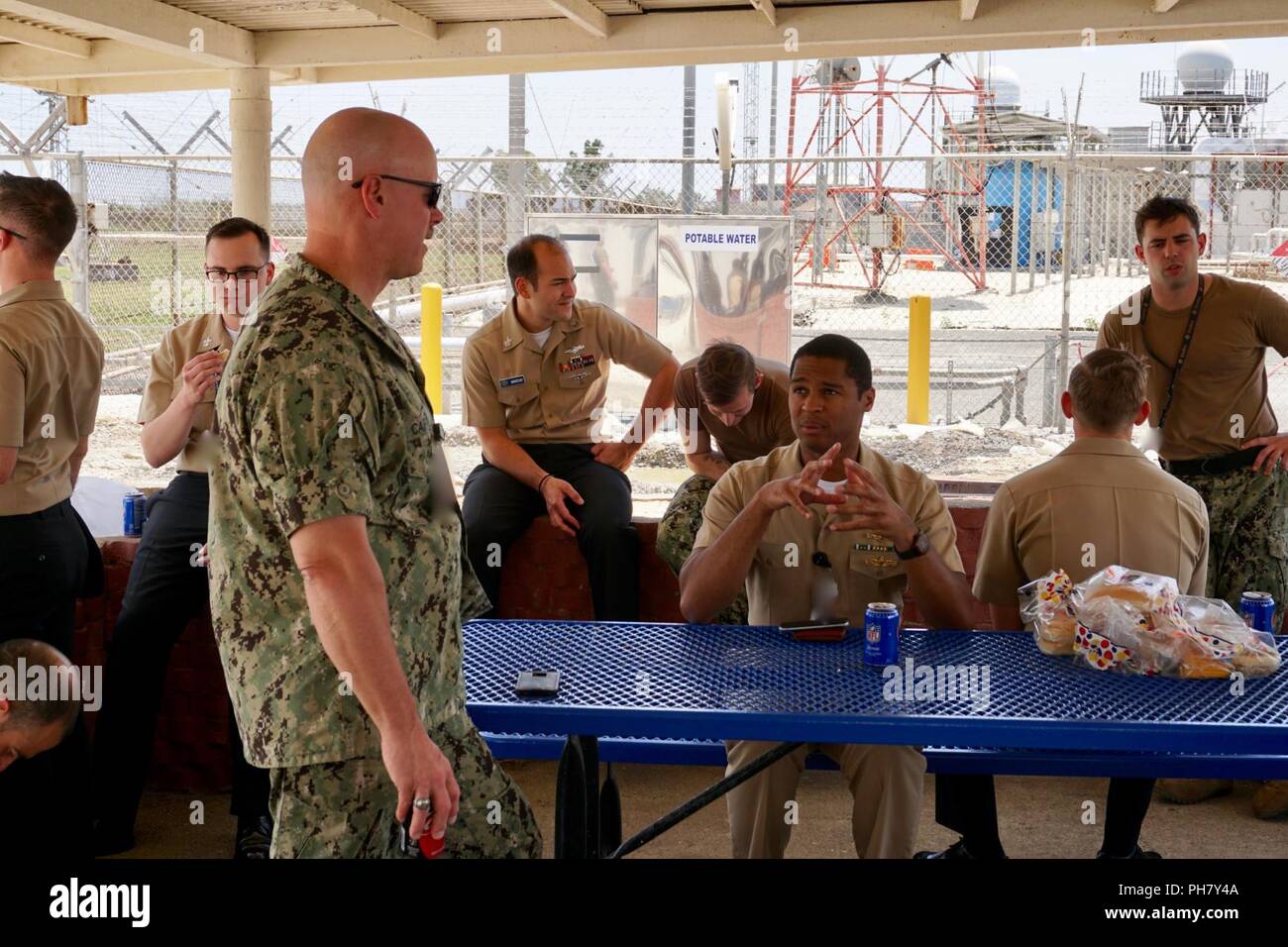 LT Rogers of NCTS Sicily's Operations Department speaks with FORCM ...