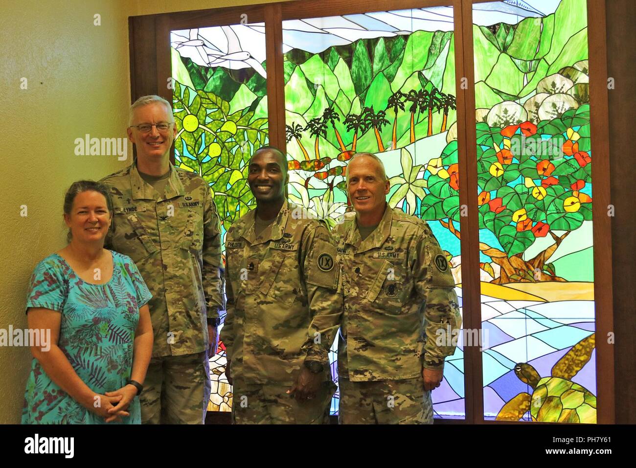 (L-R) Michelle Caron, stained glass designer and creator, Chaplain (Col ...