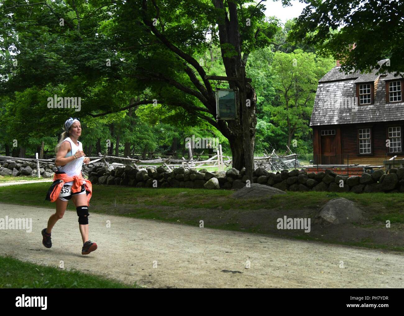 Jennifer Finazzo runs through the Battle Road Trail in Concord, Mass ...