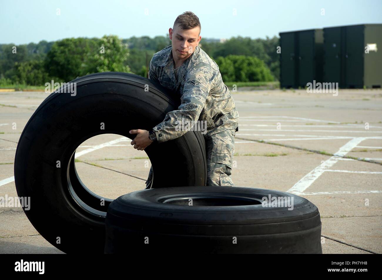 An Airman stacks tires during the Logistics Readiness Squadron Rodeo ...