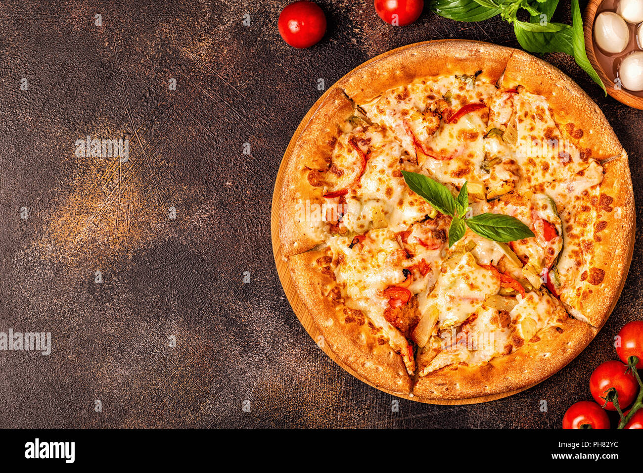 Pizza with chicken, pepper, pineapple, top view Stock Photo - Alamy