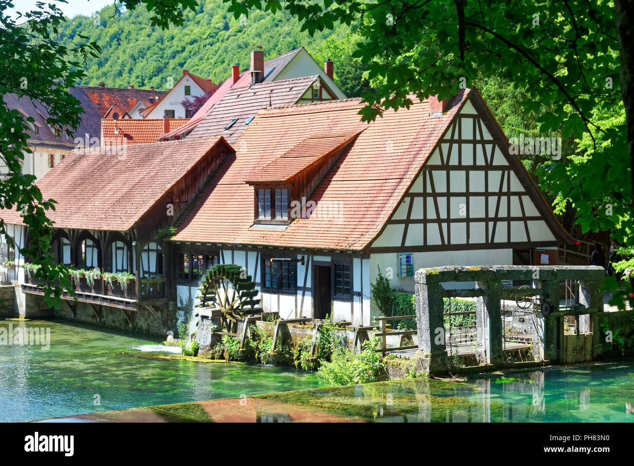 Historical hammer mill at the Blautopf, karst spring, water wheel ...