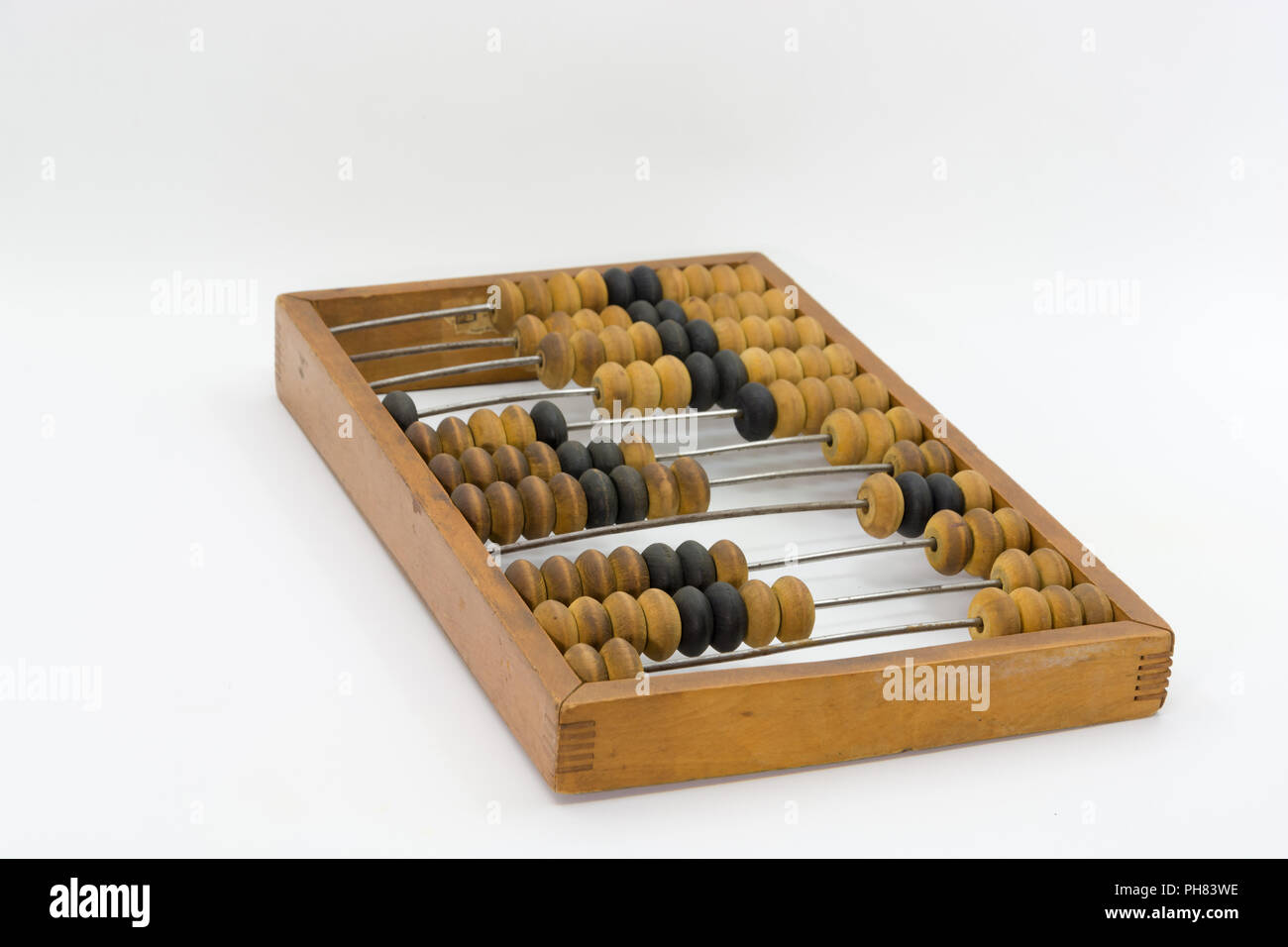 Old brown wooden abacus on a bright white background Stock Photo - Alamy
