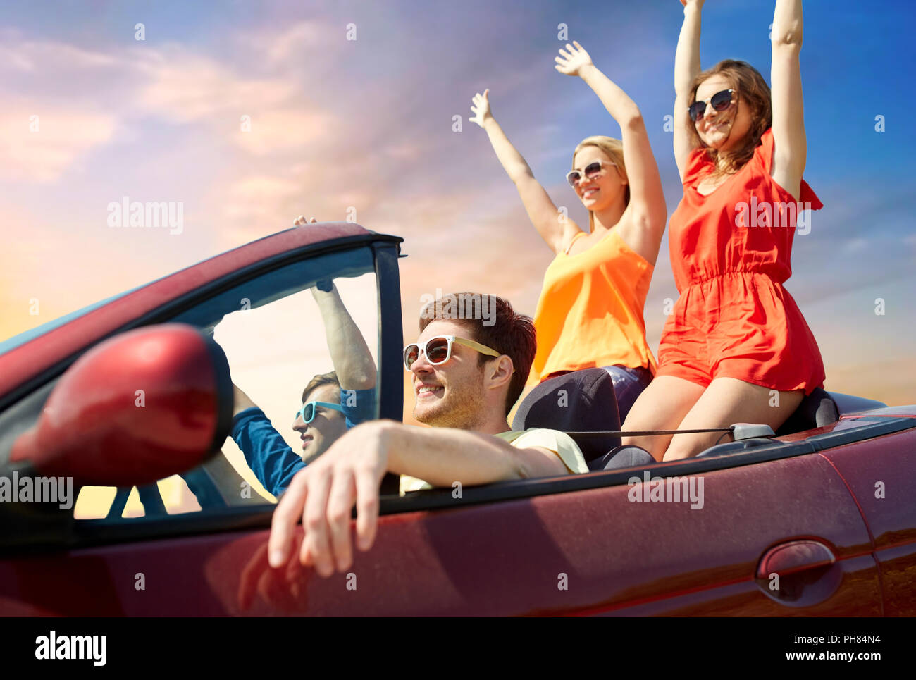 Happy friends driving in hi-res stock photography and images - Alamy