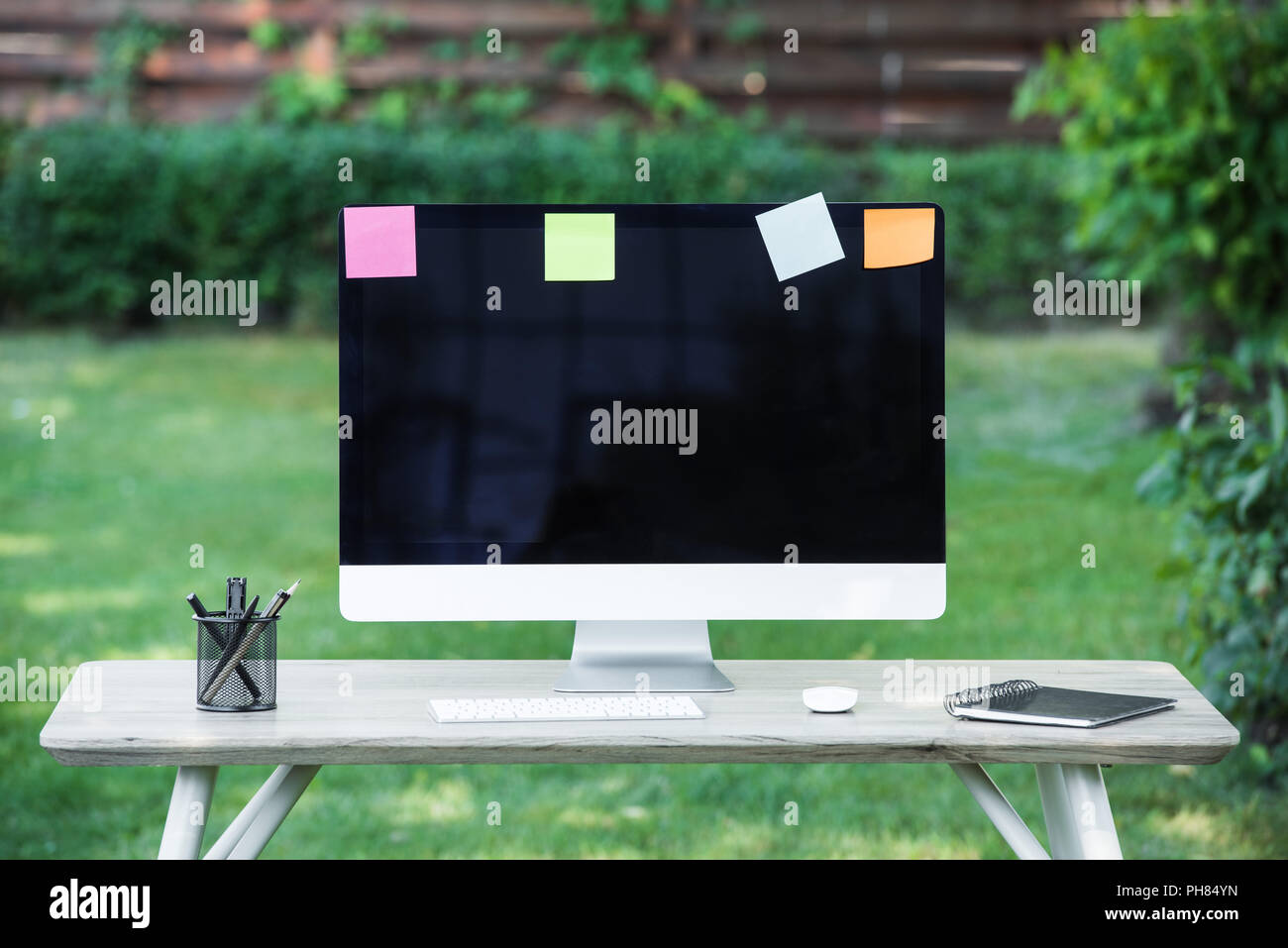 selective focus of computer monitor with blank screen and stick it ...