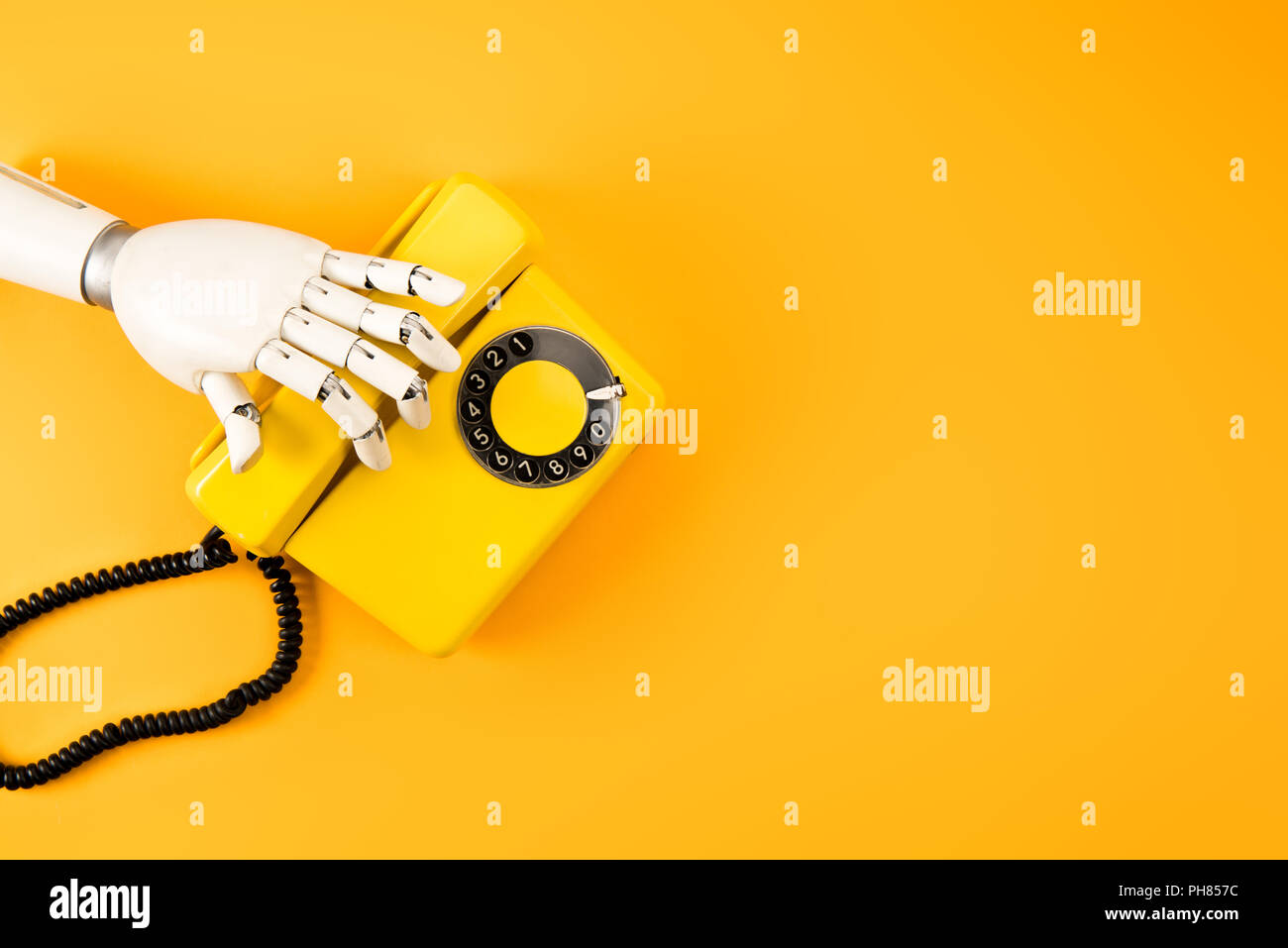 Hand reaching for phone hi-res stock photography and images - Alamy
