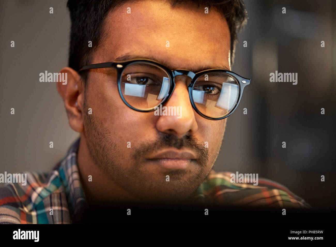 Indian man working at office hi-res stock photography and images - Alamy