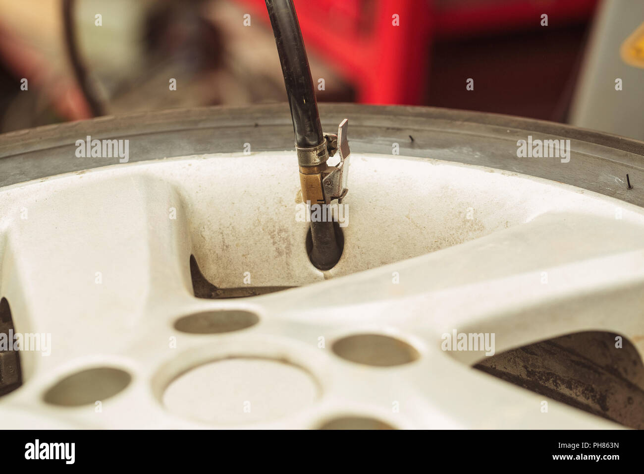 Filling up a tire hi-res stock photography and images - Alamy