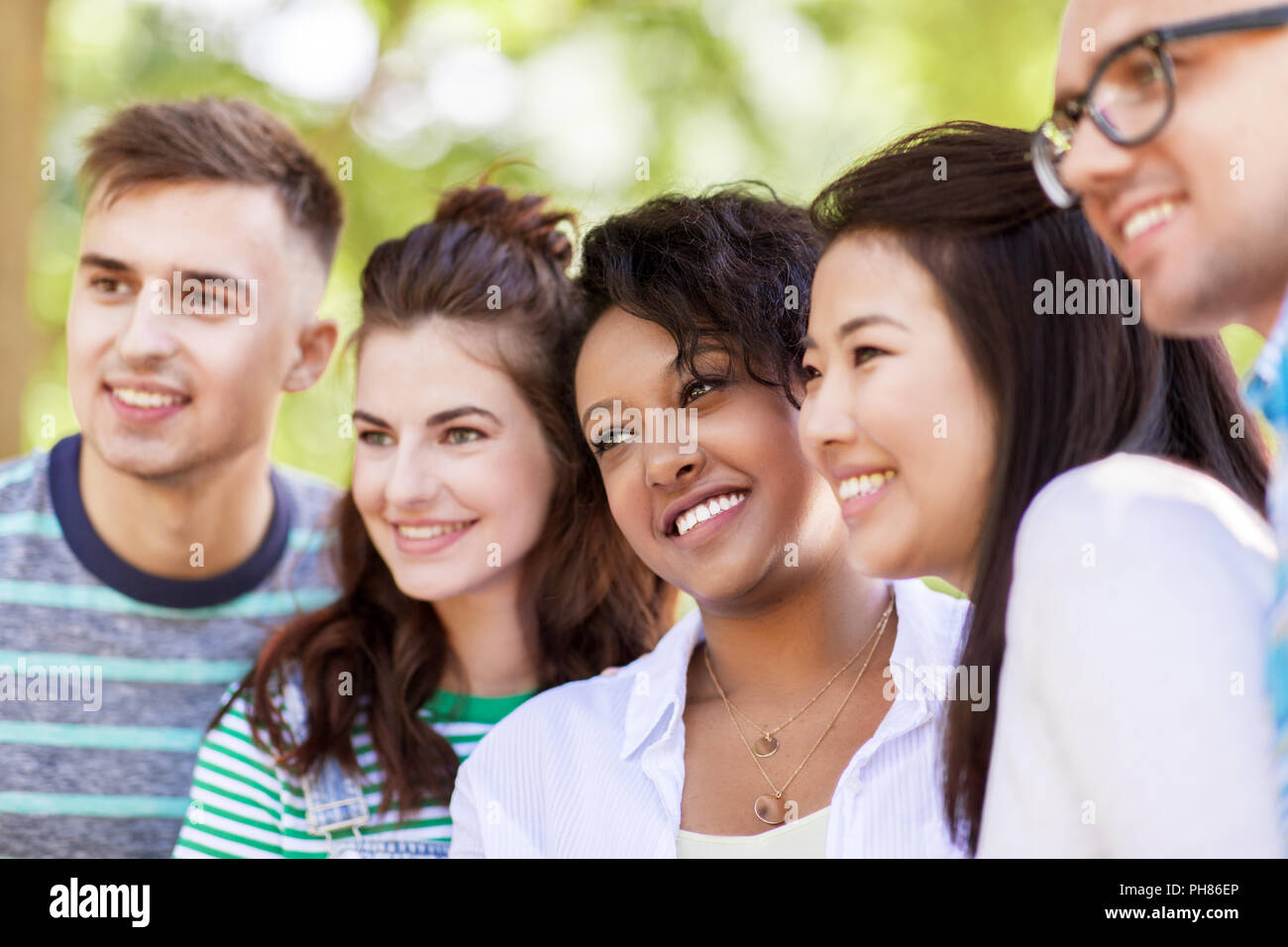 group of happy smiling friends outdoors Stock Photo - Alamy