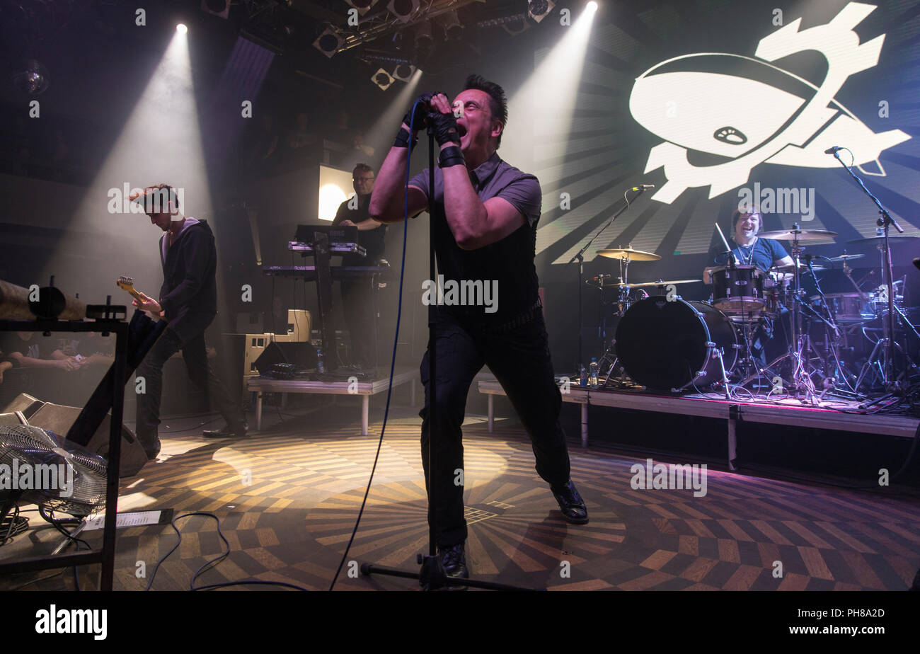 Jurgen Engler (center), lead vocalist of German electro-industrial ...