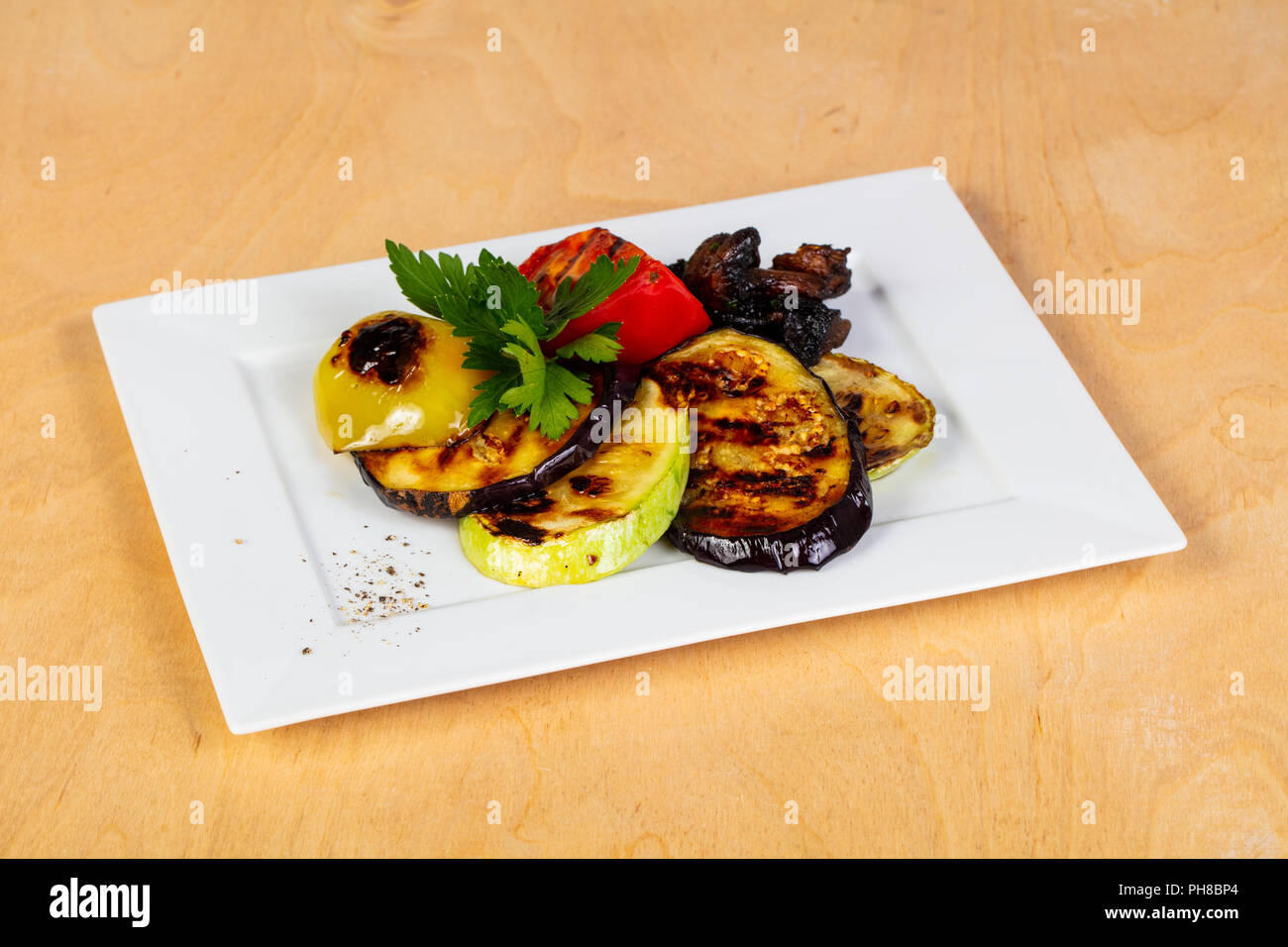 Grilled vegetables heap in the plate Stock Photo - Alamy