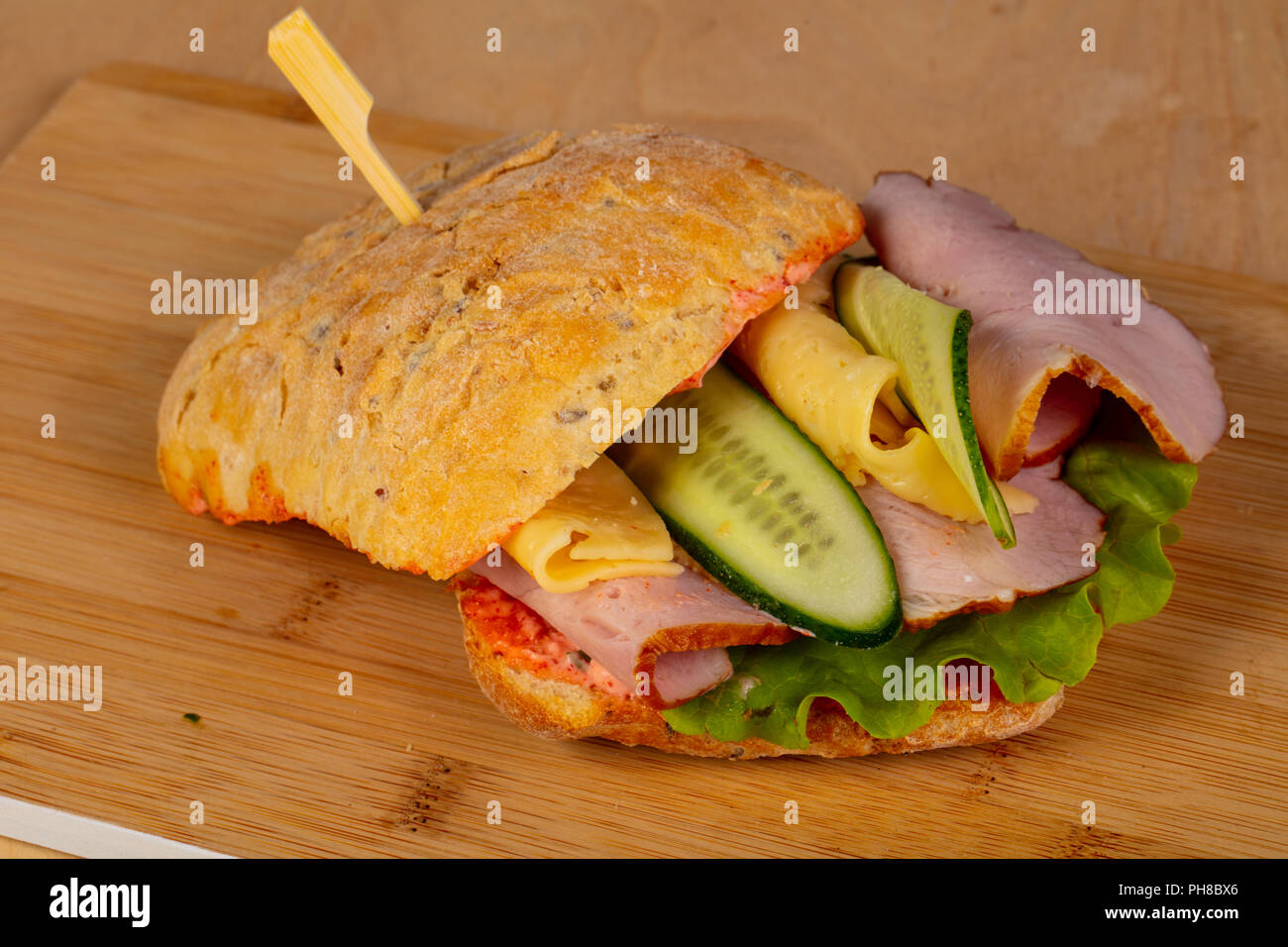 Panini with ham and cucumbers Stock Photo - Alamy