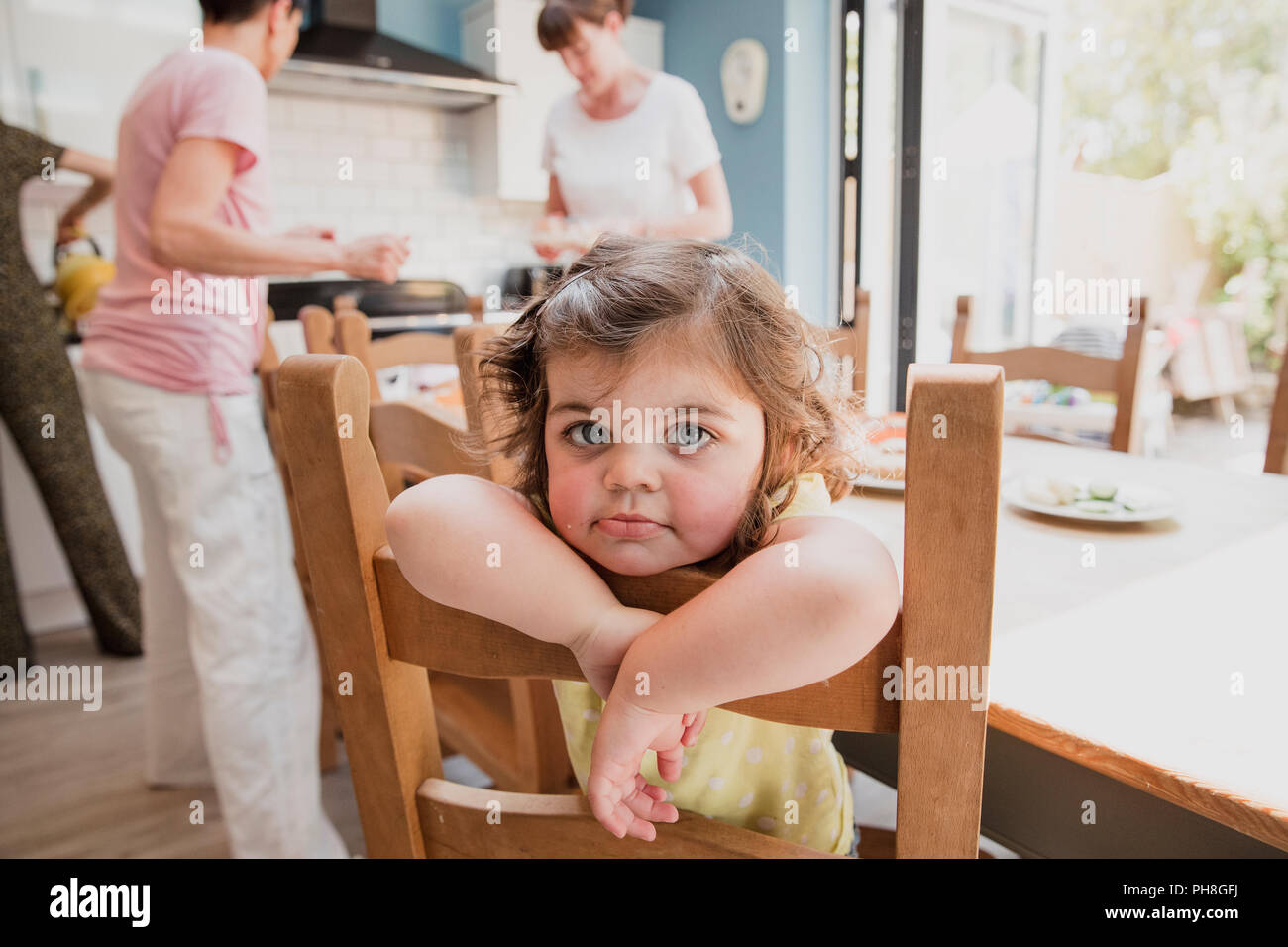 Girl sat in chair hi-res stock photography and images - Alamy