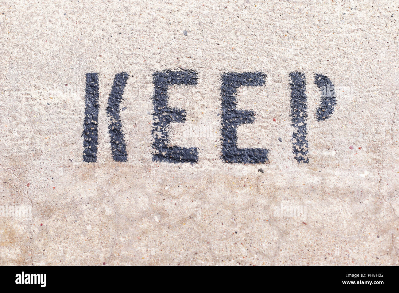 keep word on the marble texture wall Stock Photo - Alamy