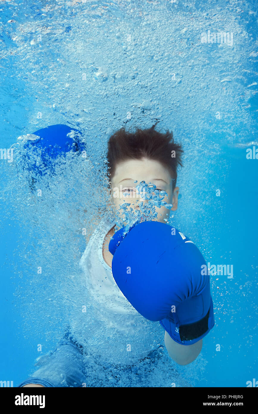 Teenager Boy Swimming Underwater In High Resolution Stock Photography ...