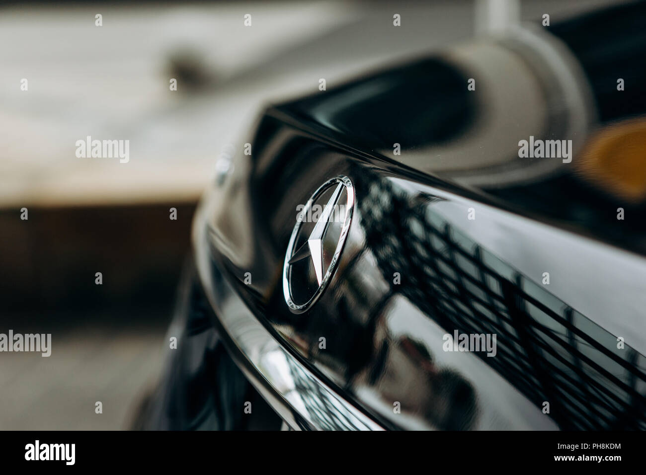 Berlin, August 29, 2018: A close-up of the Mercedes sign and the back ...