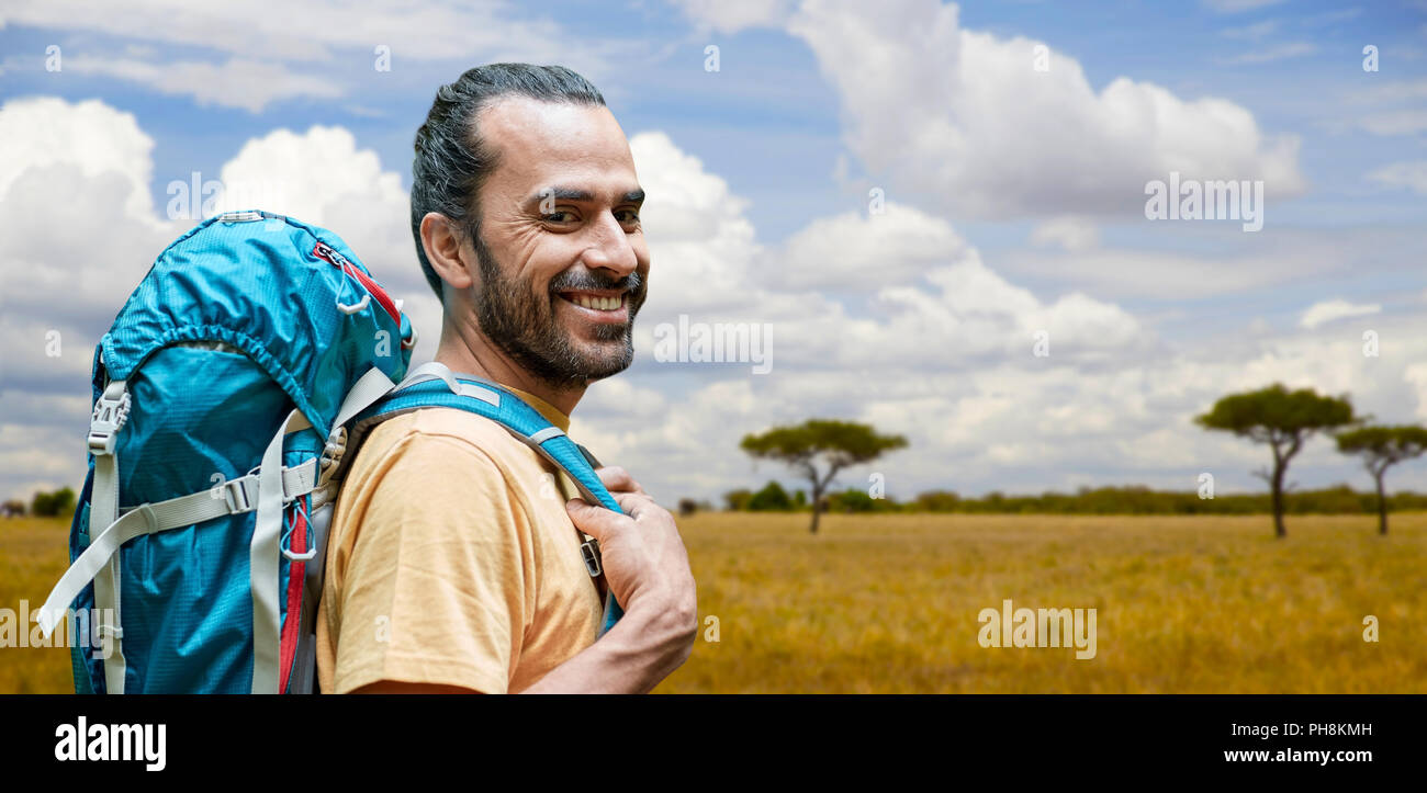 Man backpack african hi-res stock photography and images - Alamy