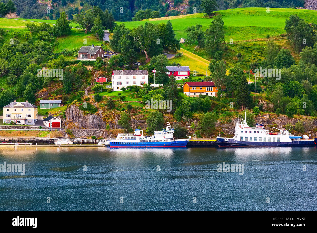 Norwegian fjord village and Sognefjord landscape in Flam, Norway ...