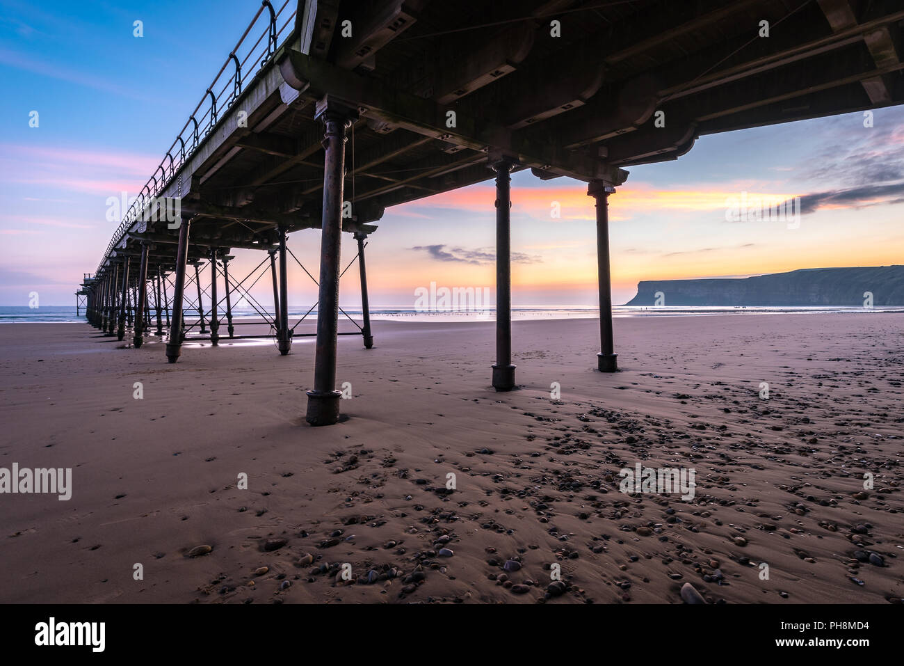 Under Saltburn Pier at Sunrise Stock Photo - Alamy