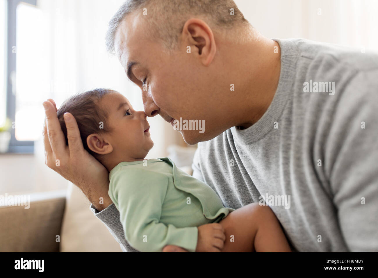 happy father with little baby boy at home Stock Photo - Alamy