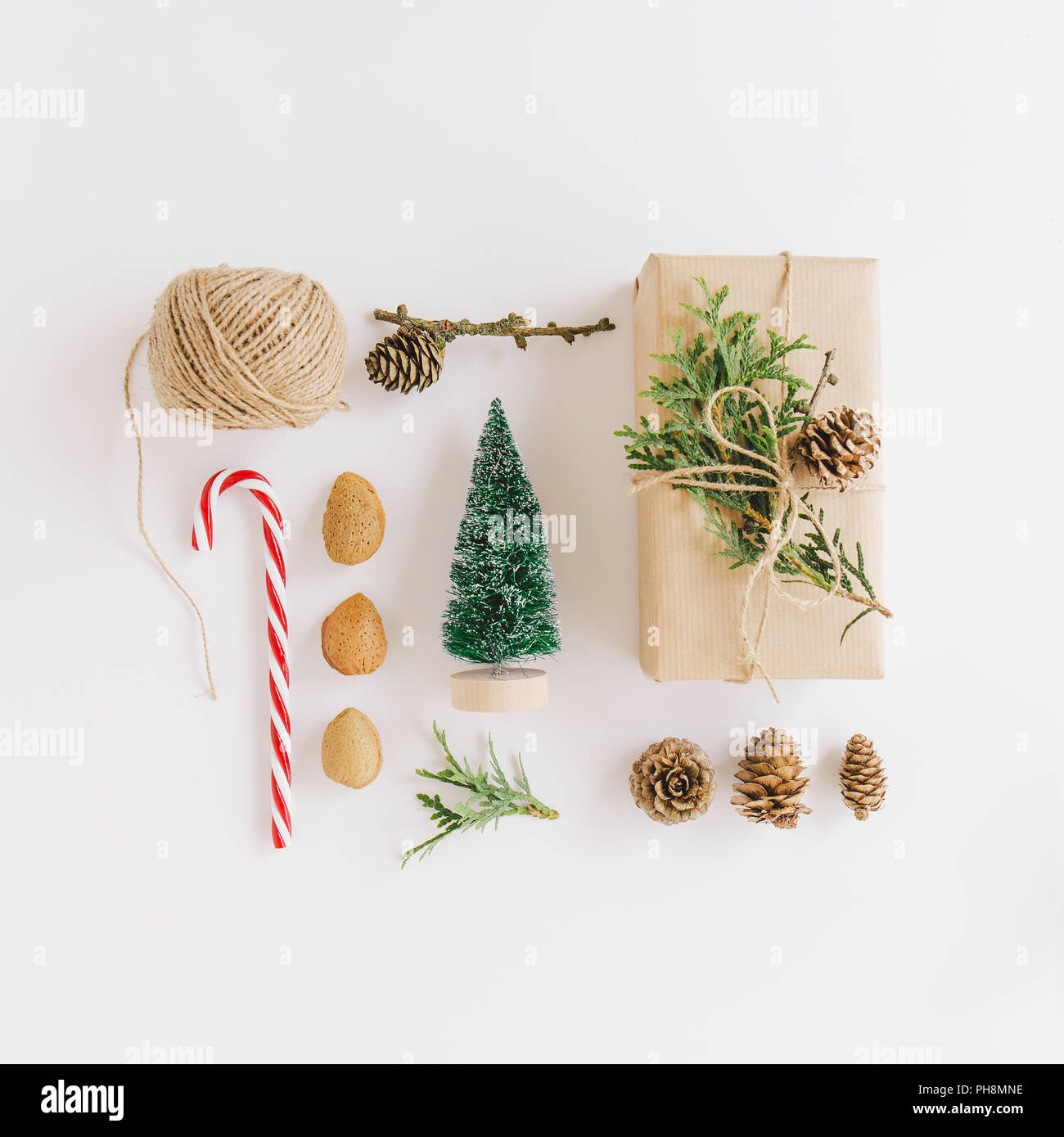 Christmas flat lay with gifts, craft paper, and christmas accessorises ...