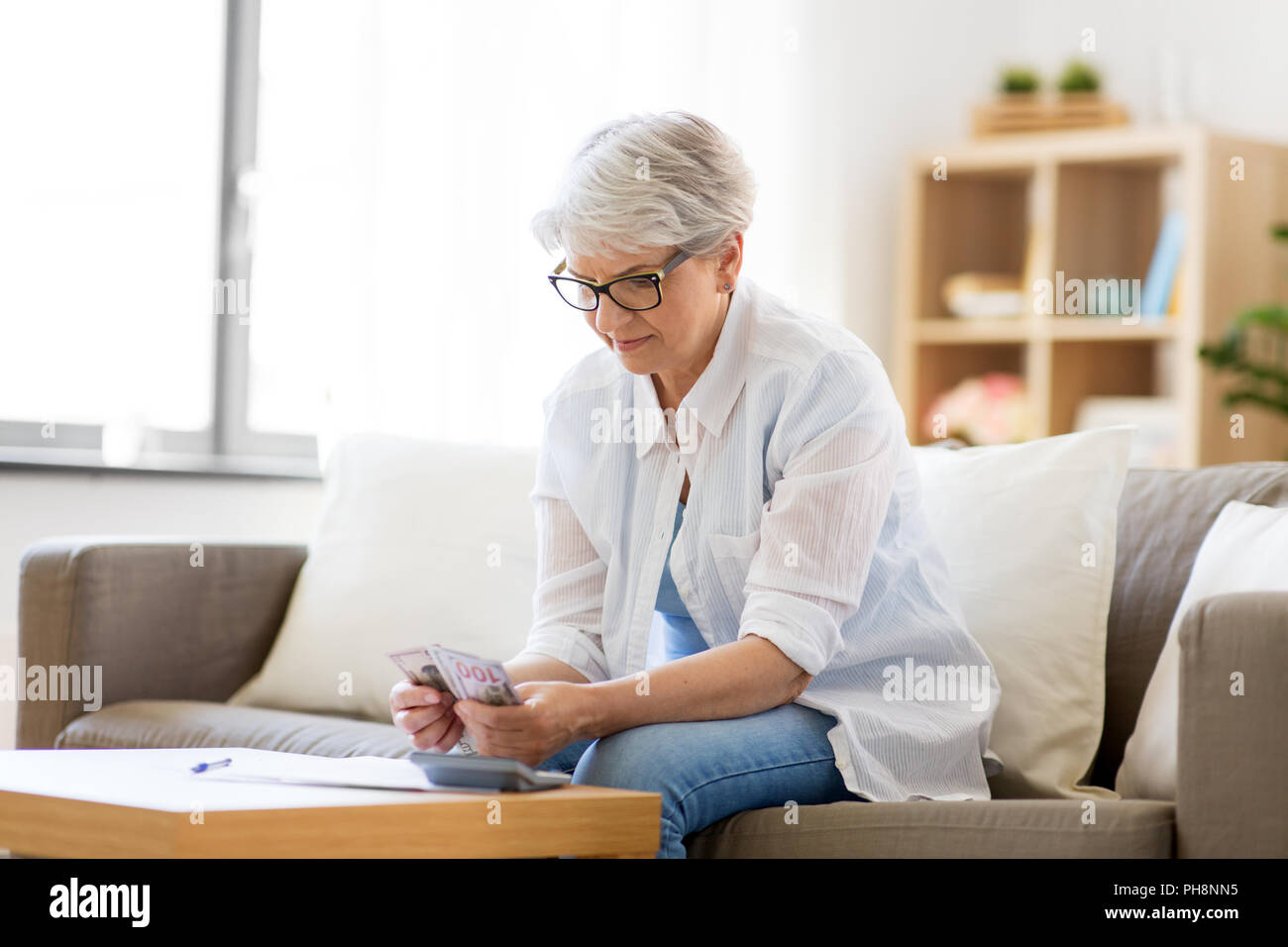 senior woman counting money at home Stock Photo - Alamy senior woman counting money at home Stock Photo - Alamy