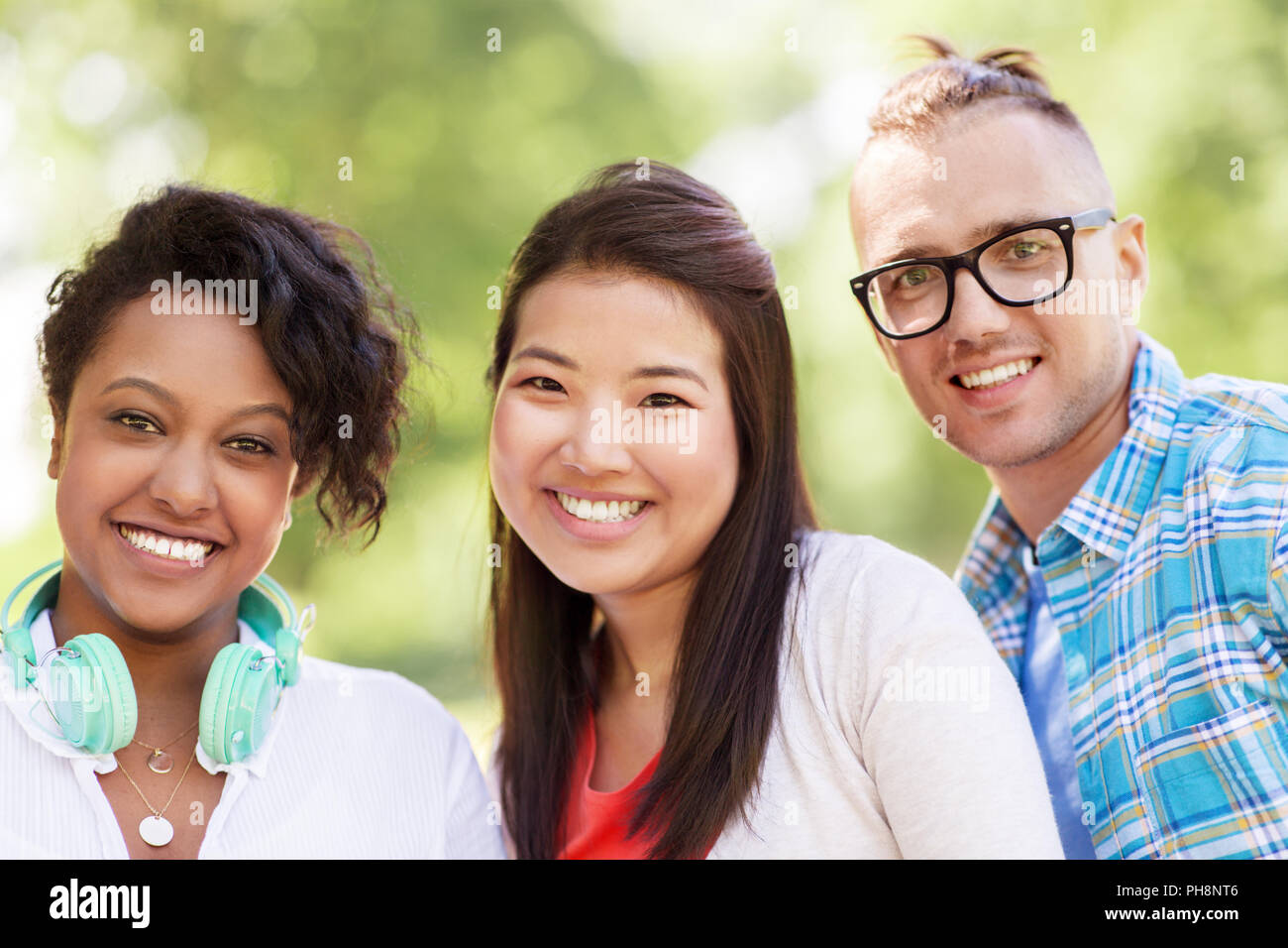 group of happy smiling friends outdoors Stock Photo - Alamy