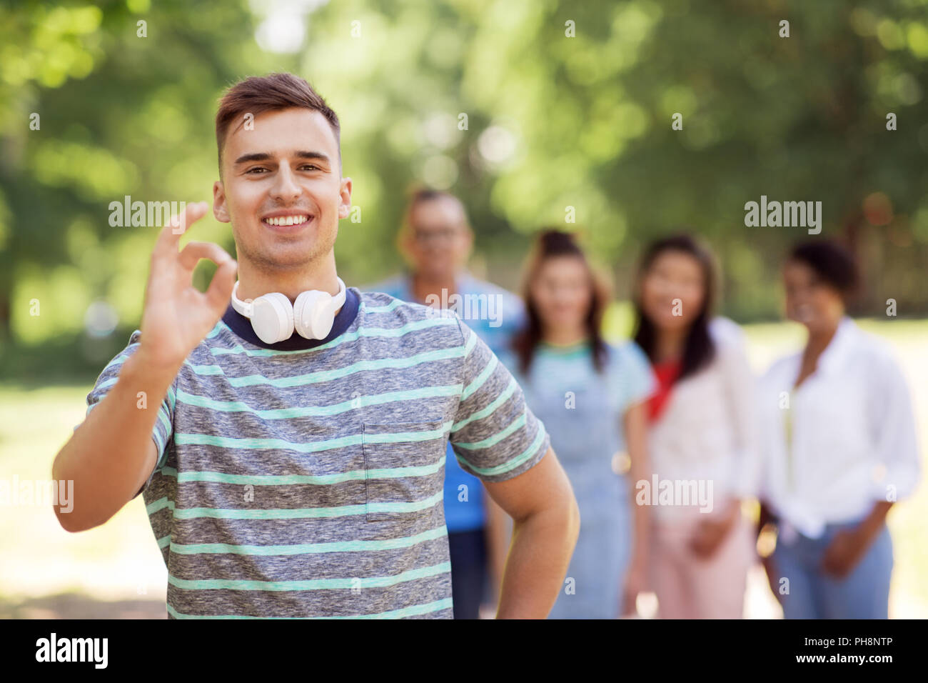 group of happy international friends outdoors Stock Photo - Alamy