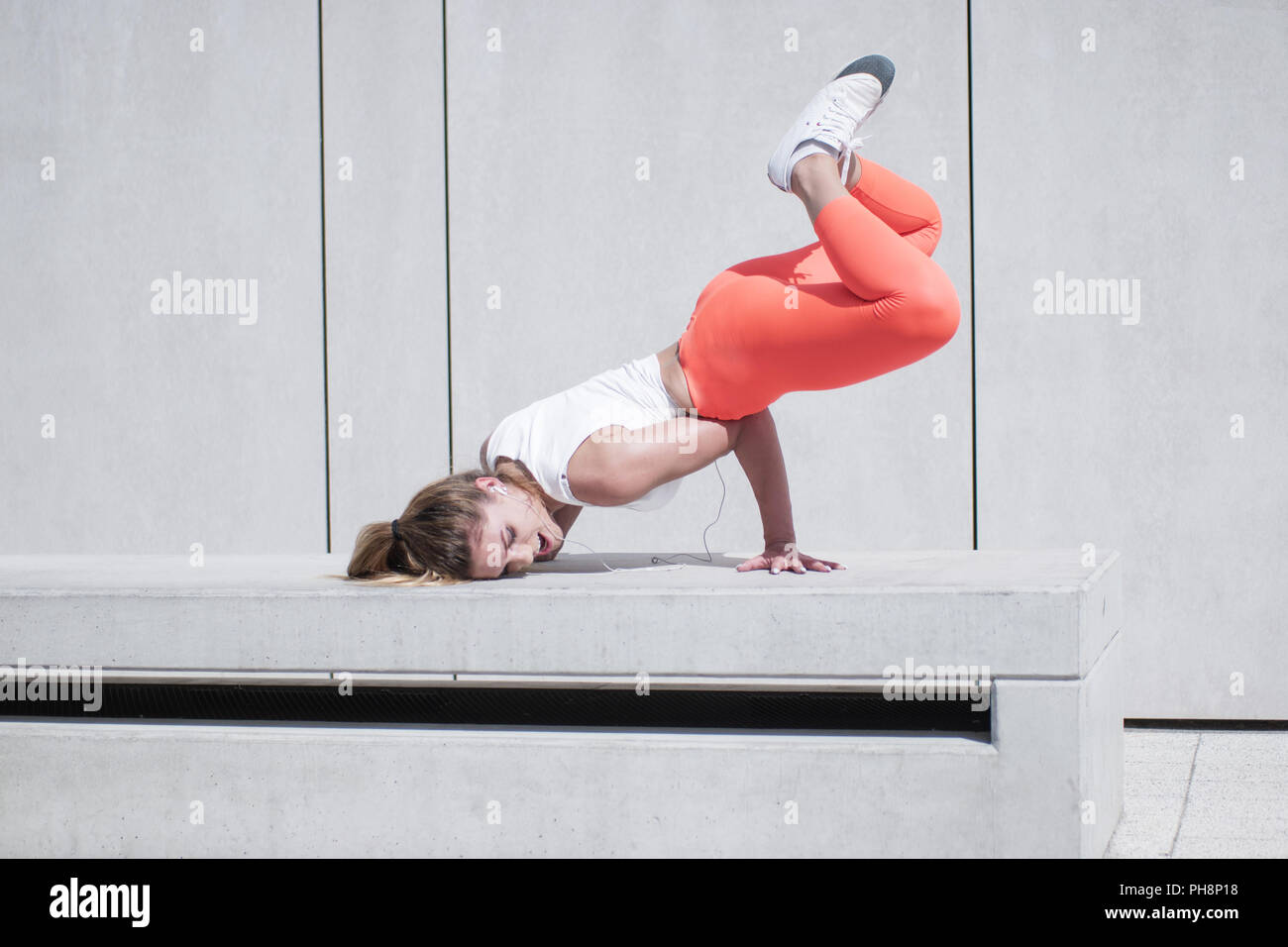 Young Woman in Hip Hop Dance Pose on Bench Stock Photo - Alamy
