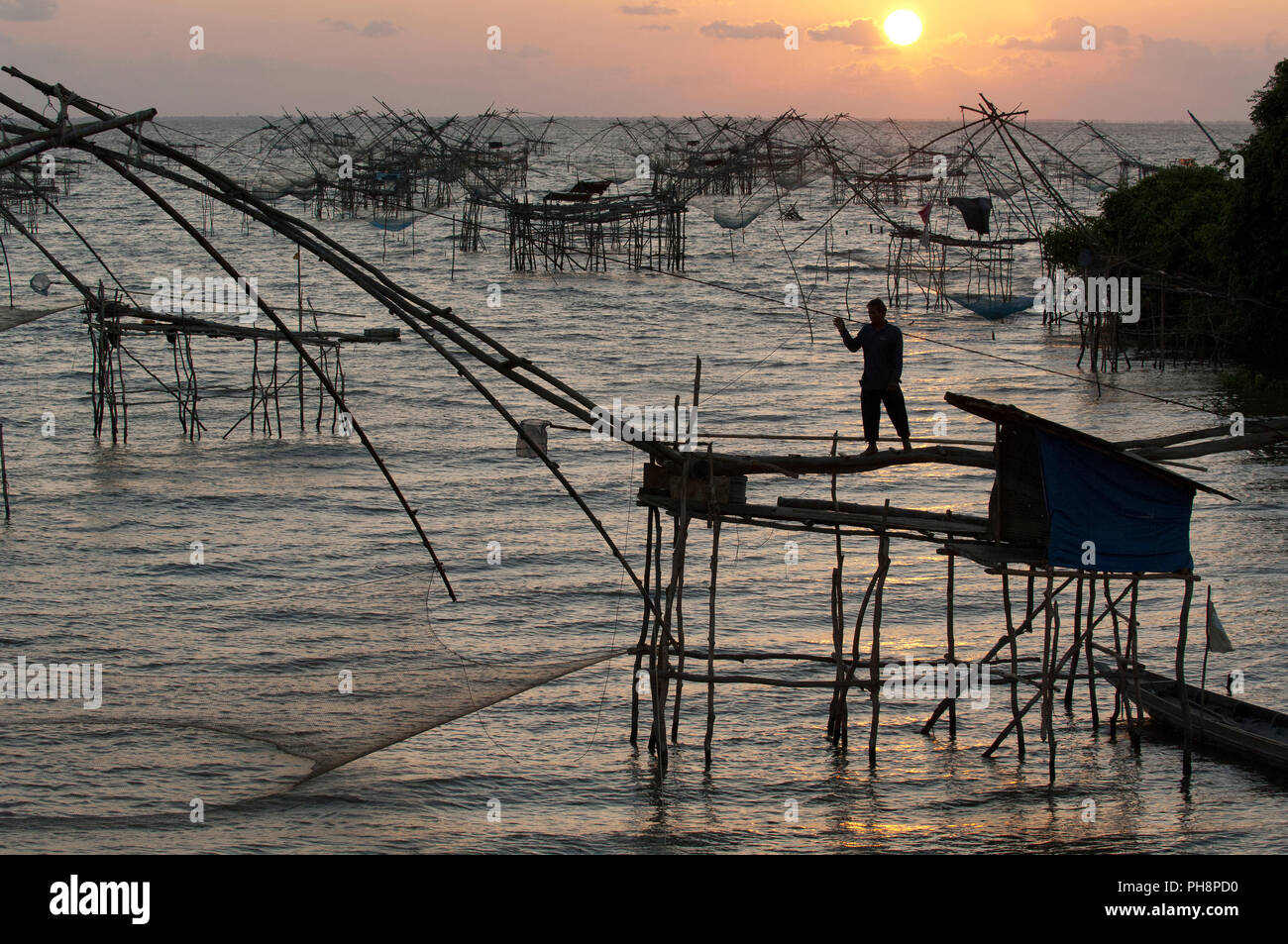 Shore-operated lift net - Sunrise - Fisherman - Phatthalung - Southern ...